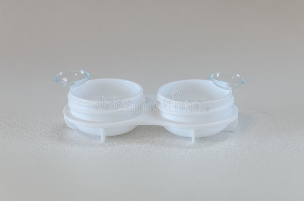 Contact Lenses for Vision Correction Stand on a Container for Storing ...