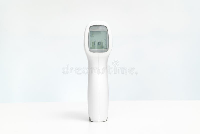 Contactless Electronic Thermometer on White Background. Stock Photo ...