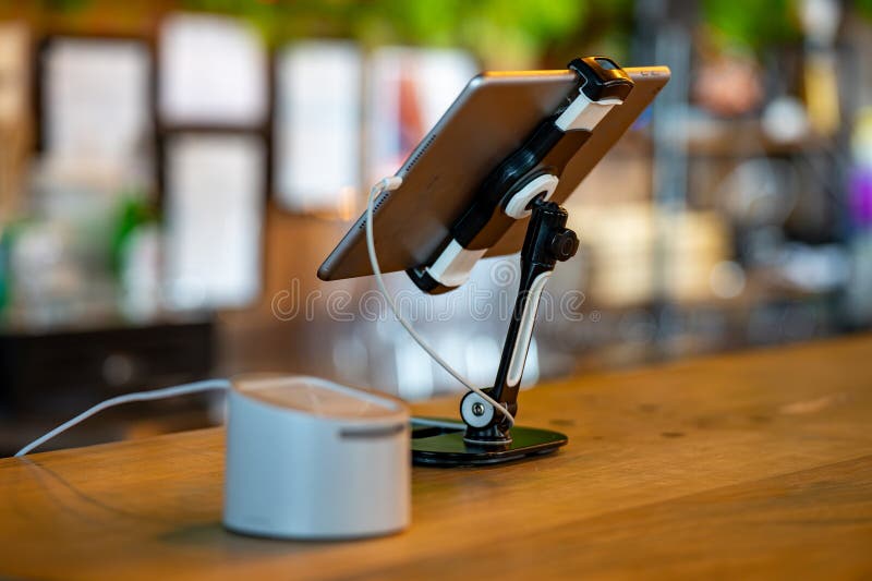 Contactless Mobile Payment Device and Tablet in Restaurant Stock Photo ...