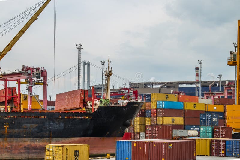 The Container is Being Lowered from the Ship that is Approaching the ...
