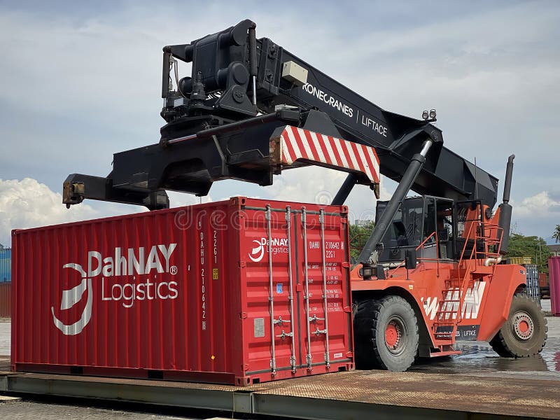 A Container is Being Weighed by a Container Lifting Machinery ...