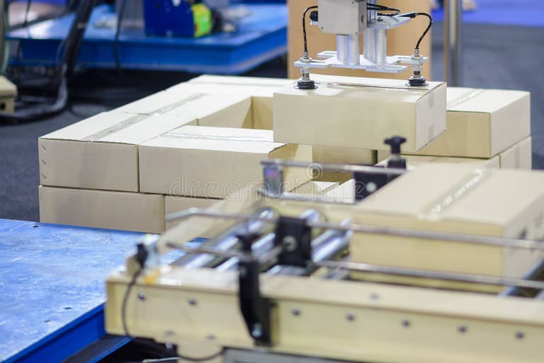 The Container Box Transportation Process by Robotic Arm Stock Photo ...