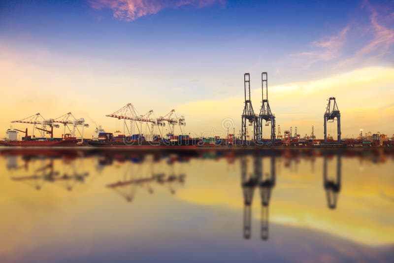 Container Cargo Freight Ship with Working Crane Bridge in Shipyard at ...