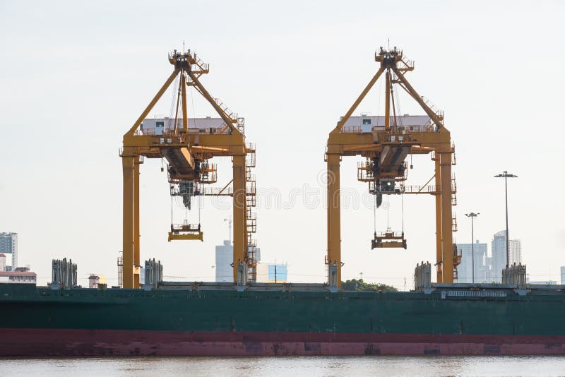 Container Cargo Freight Ship with Working Crane Bridge in Shipyard ...