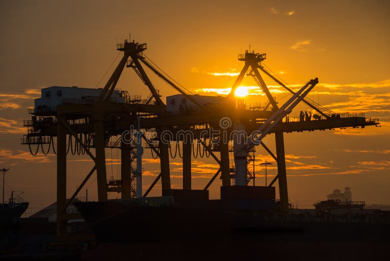 Container Cargo Freight Ship with Working Crane Bridge in Shipyard at ...