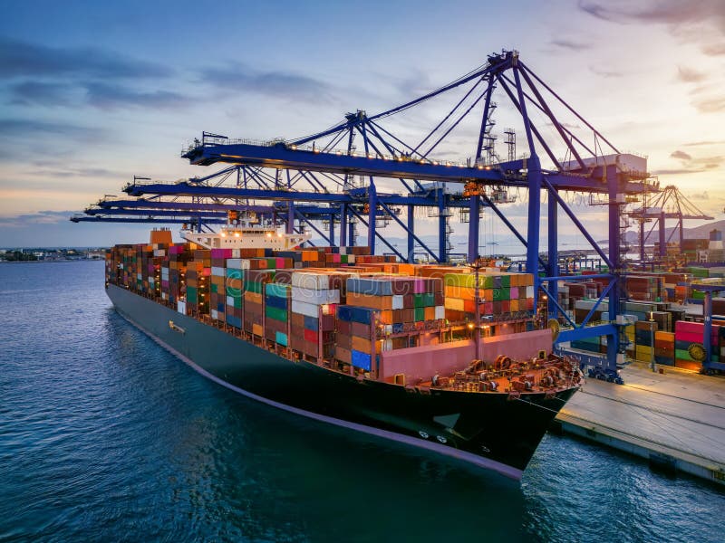 A Container Cargo Ship is Beeing Loaded in a Commercial Dock Stock ...