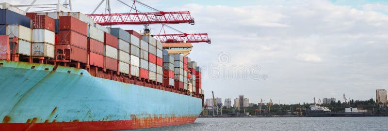 Container Cargo Ship Load in the Seaport. Logistics and Transportation ...