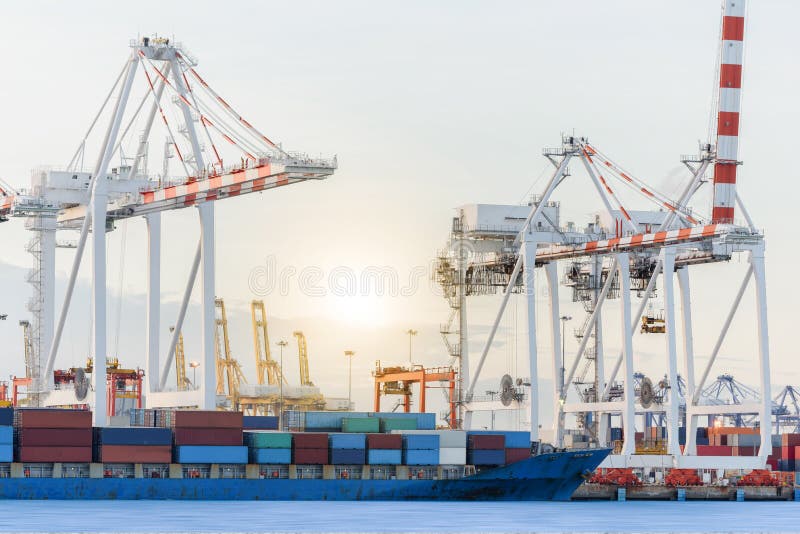 Container Cargo Ship with Ports Crane Bridge in Harbor Stock Photo ...