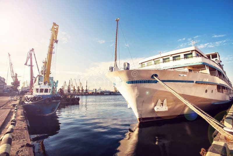 Container Cargo Ship with Working Crane Bridge in Shipyard Background ...