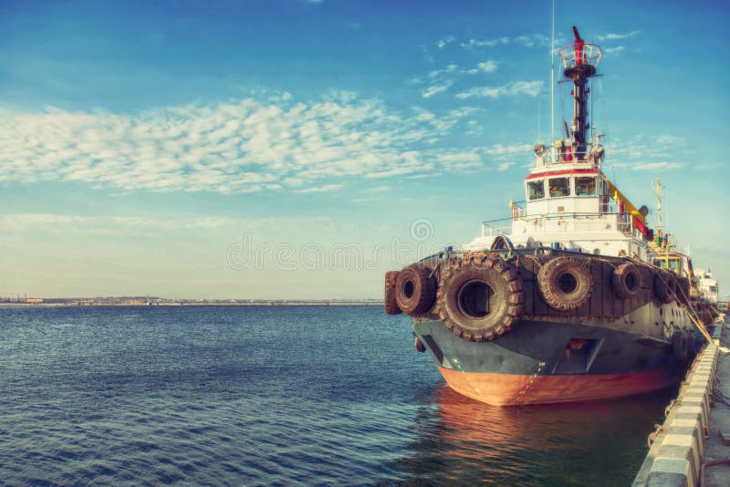 Container Cargo Ship with Working Crane Bridge in Shipyard Background ...