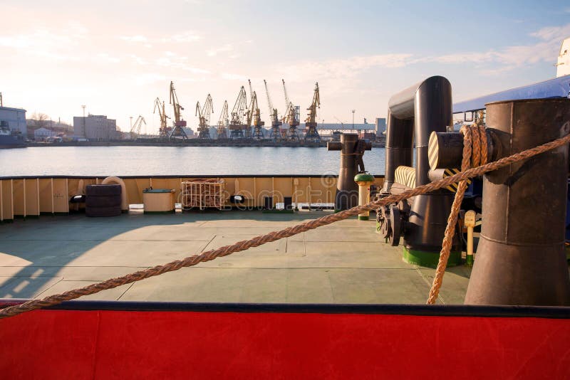 Container Cargo Ship with Working Crane Bridge in Shipyard Background ...