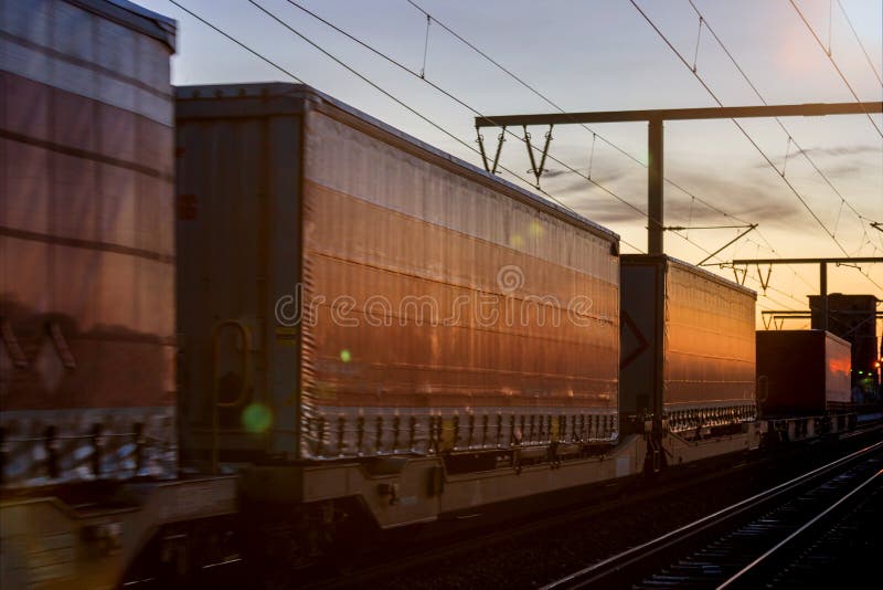 Container Cargo Train in the Evening Sun Stock Photo - Image of train ...