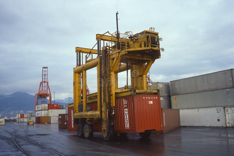 Container Carrier on Shipping Dock Editorial Photography - Image of ...