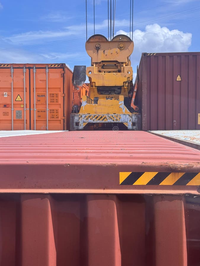 Container Crane Positioning Itself between the Containers To Initiate ...