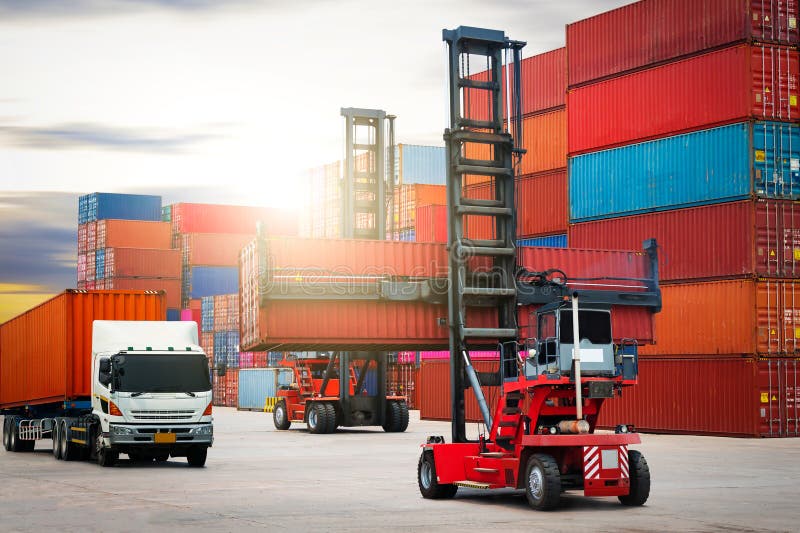 Container Crane Tractor Lifting Up Stacking Cargo Container. Freight ...