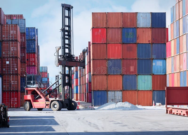 Container Forklift in the Container Yard Waiting for Packing Industry ...