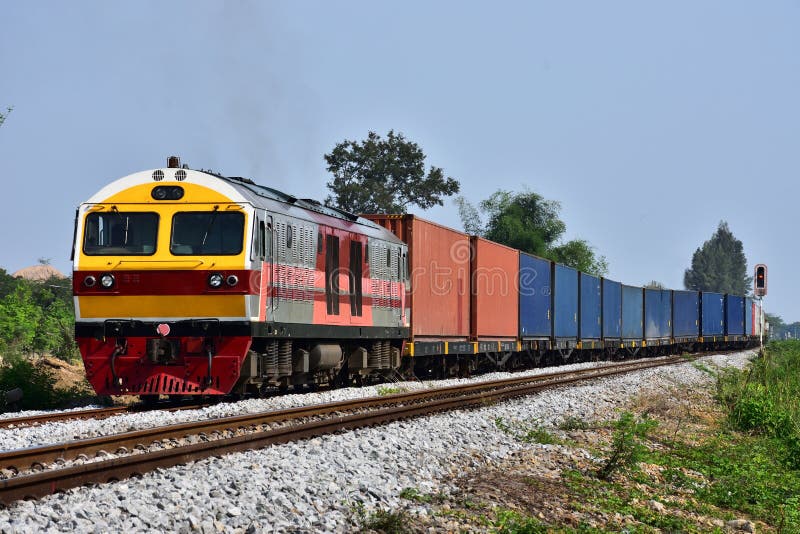 Container-freight Train by Diesel Locomotive on the Railway. Editorial ...