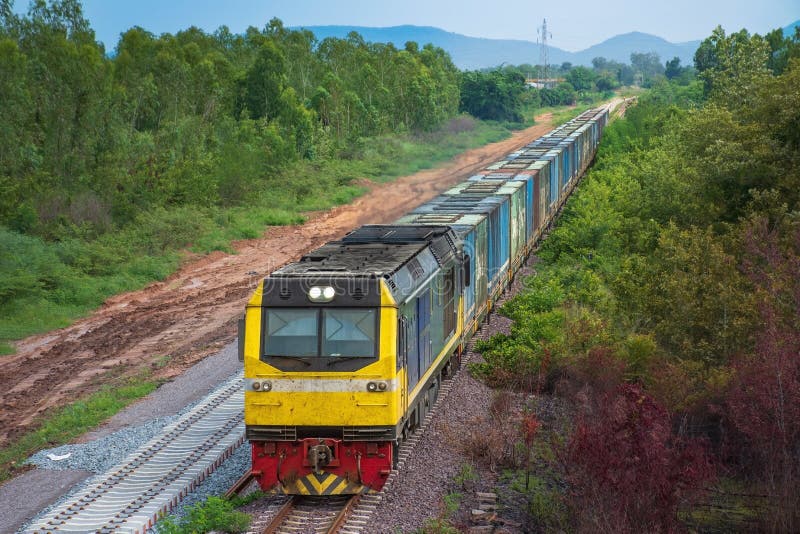 Container-freight Train by Diesel Locomotive on the Railway. Stock ...