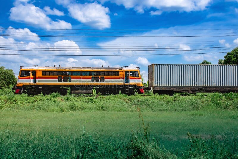Container-freight Train by Diesel Locomotive on the Railway. Editorial ...