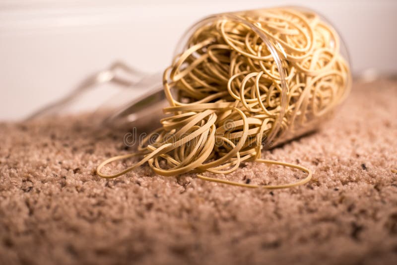 Container Full of Rubber Bands Stock Photo - Image of clear, heap ...