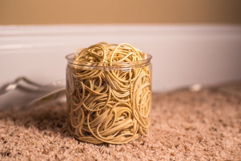 Container Full of Rubber Bands Stock Photo - Image of regular, business ...