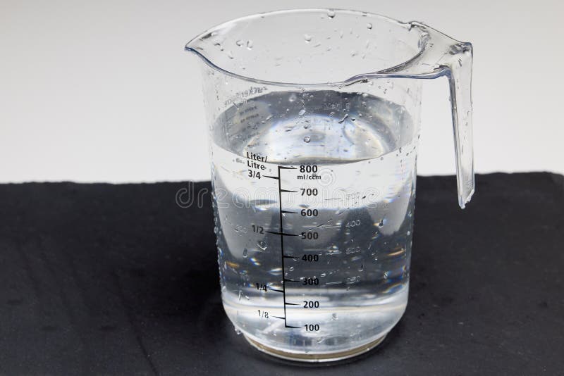 A Container with Graduated Water Stock Photo - Image of cooking ...