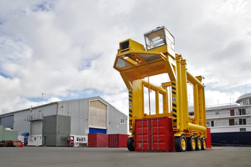 Container Handler in the Port. Lifting the Shipping Container. Stock ...