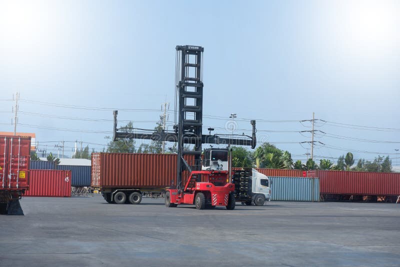 Container Stacker, Load the Container into the Truck. Transportation ...