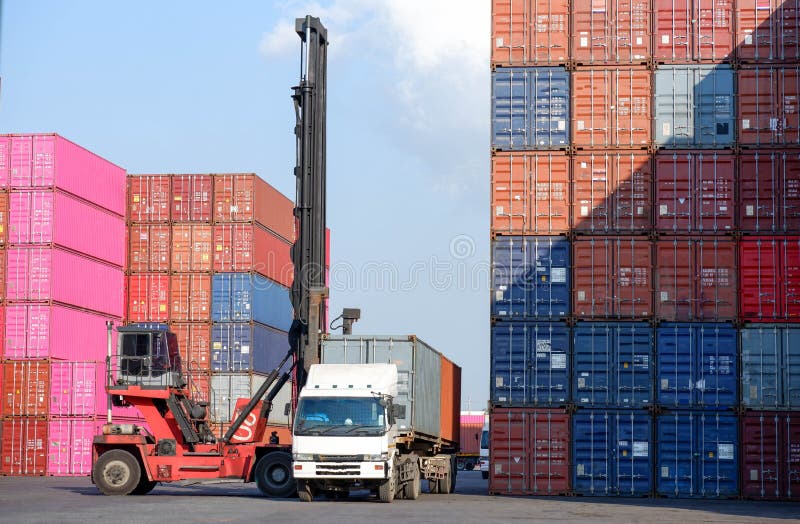 Container Handlers are Loading Containers into Trucks Stock Photo ...