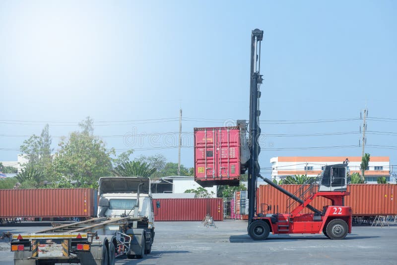 Container Handlers are Loading Containers into Trucks Stock Image ...