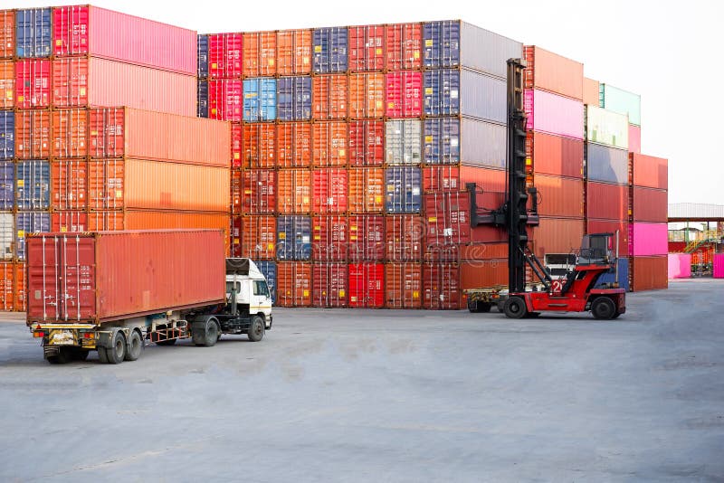 Container Handlers and Trucks in the Loading and Unloading Yard Stock ...