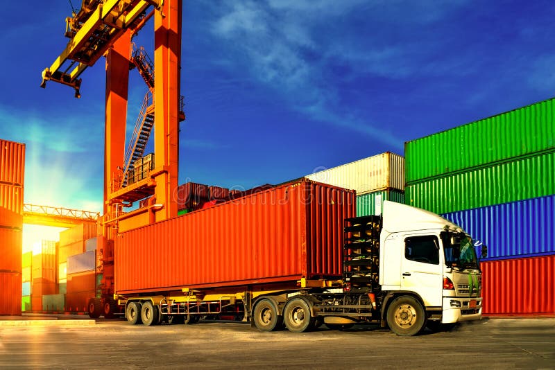 Container Handling. Container Truck Picking Up Container at Yard. Port ...