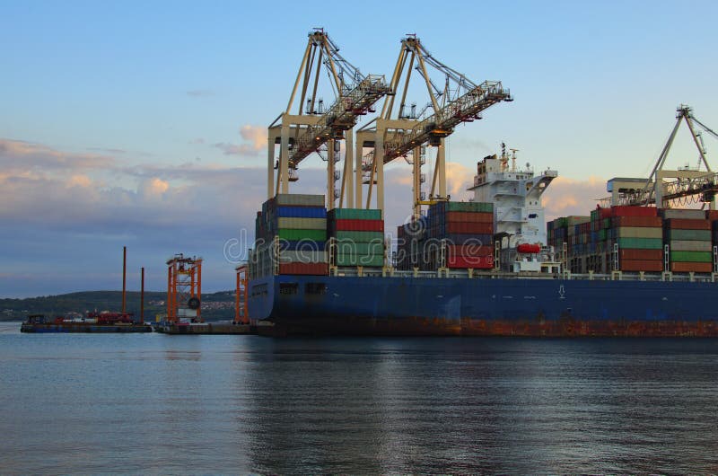 Container Loading in Cargo Freight Ship with Industrial Cranes ...