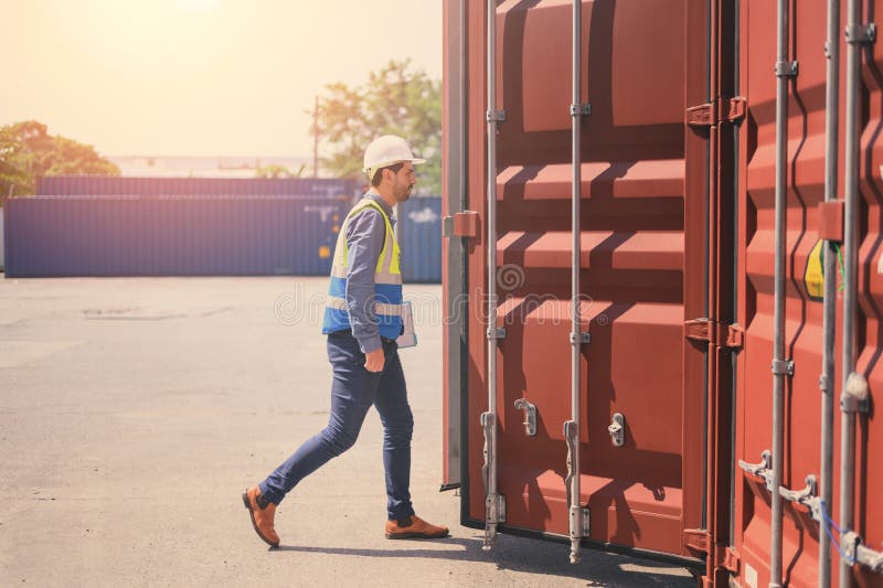 Container Logistic Operators Workers Wearing Yellow Helmets and ...