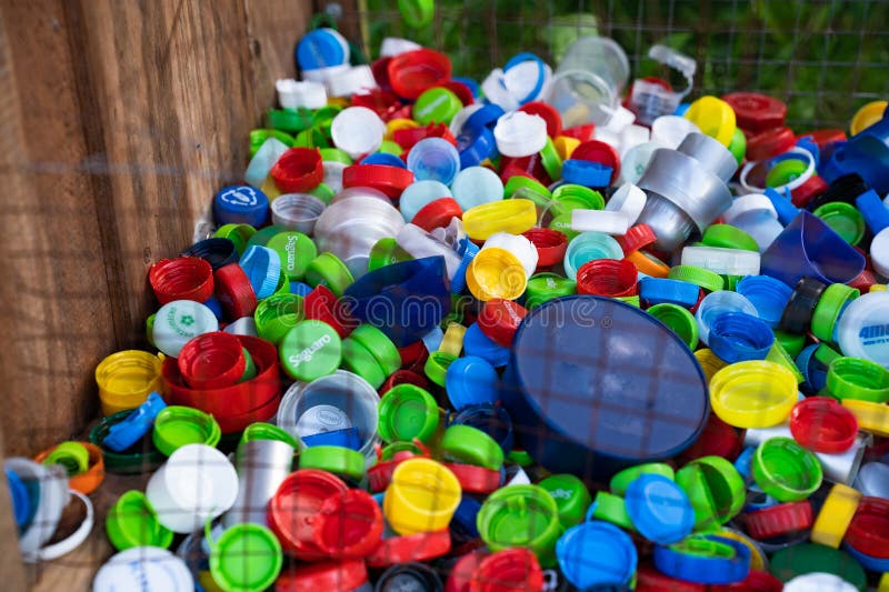 Container with Plastic Bottle Caps Stock Image - Image of reduction ...