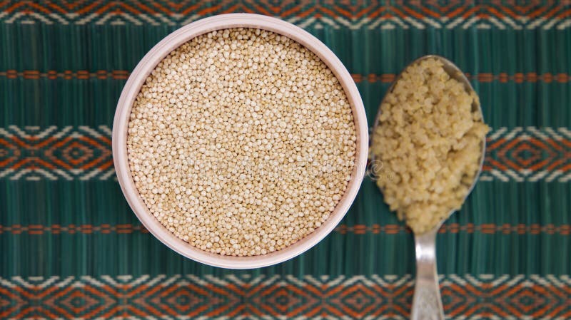 Container with Raw Quinoa and a Tablespoon of Cooked Quinoa Stock Photo ...