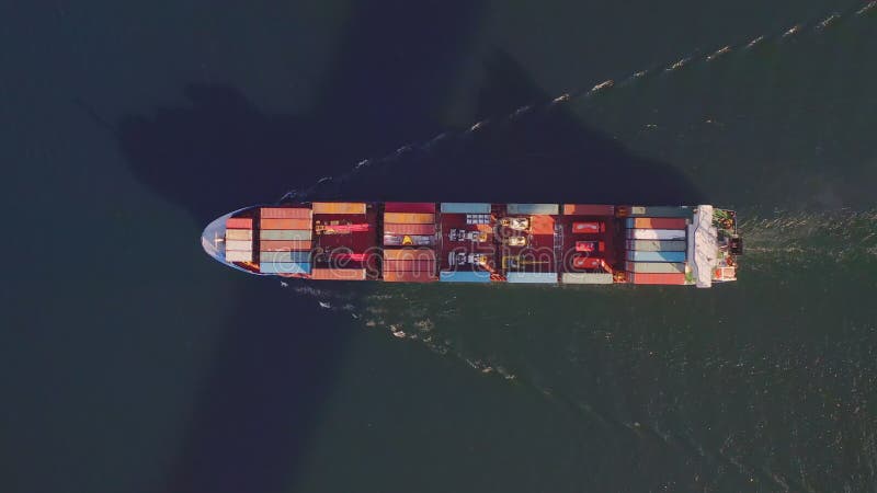 Container Ship with Cargo of Containers Passes Under the Bridge Stock ...