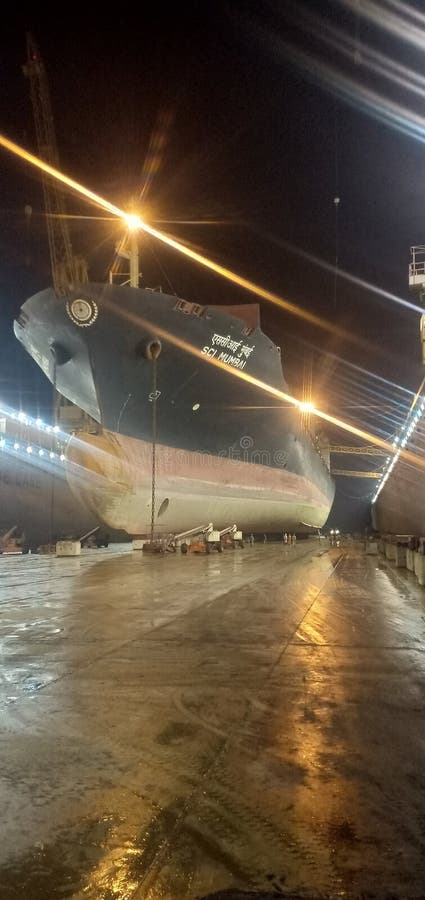 A Container Ship is Docked on Blocks Editorial Stock Image - Image of ...