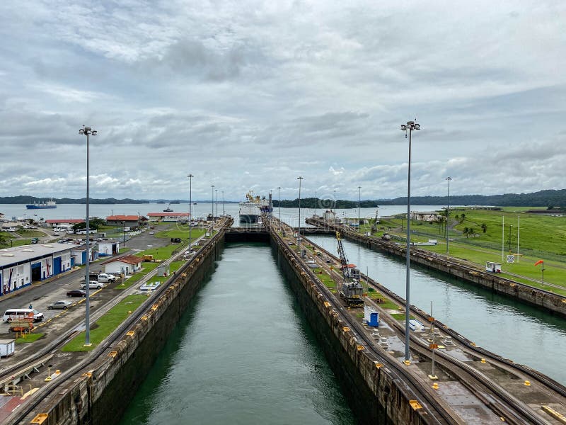 A Container Ship Entering the First Lock in the Panama Canal Editorial ...