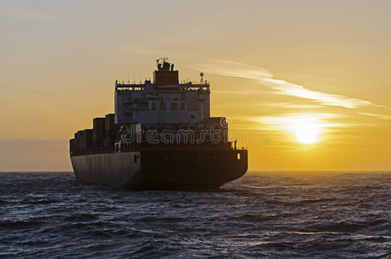 Container Ship at Sunset stock image. Image of shipping - 4859045