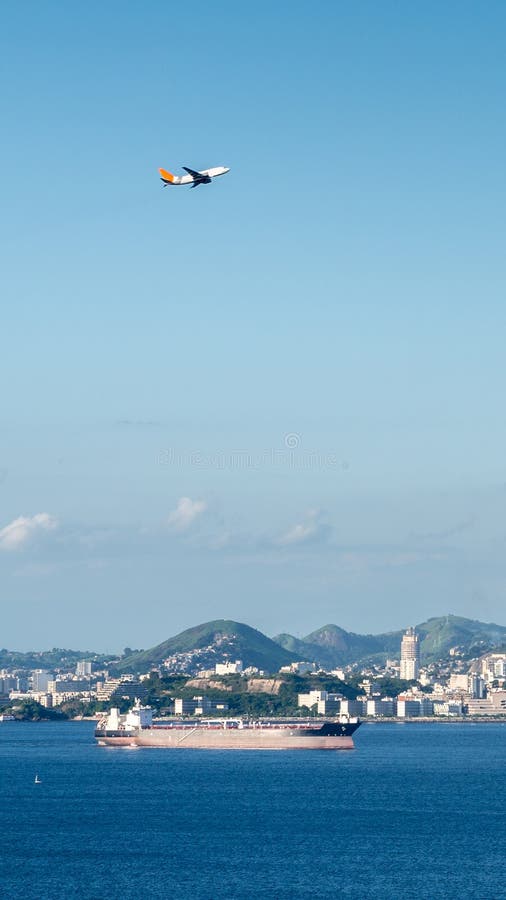 Container Ship in Import Export and Business with Airplane in Sky ...