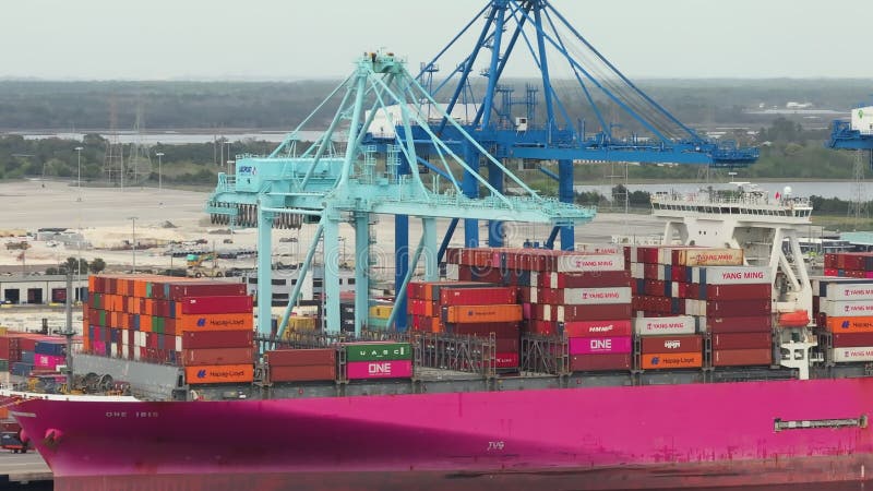 Container Ship in Import and Export Logistic Business. Cranes in ...