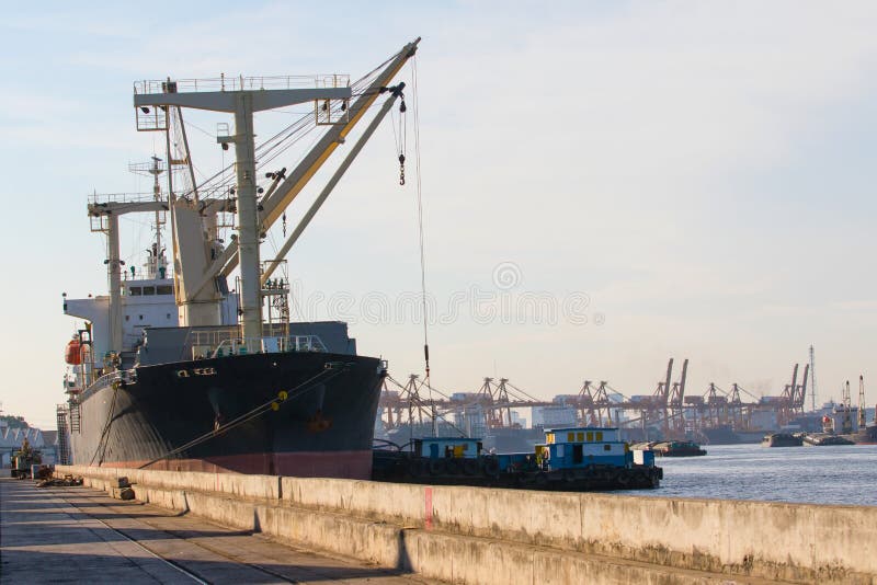Container Ship Loading Material Goods from Local Ship in Habor P Stock ...