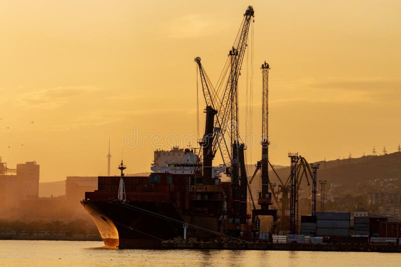 Container Ship is Loading in a Port, Evening Light Stock Image - Image ...