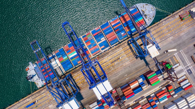 Container Ship Loading and Unloading in Deep Sea Port, Aerial Top View ...