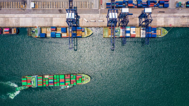 Container Ship Loading and Unloading in Deep Sea Port, Aerial Top View ...