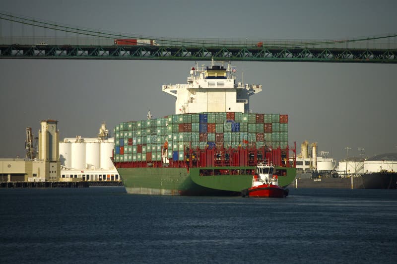 Container Ship Passes Under Bridge Stock Image - Image of container ...