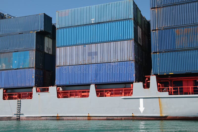 Container ship in port stock photo. Image of remolcador - 31601624