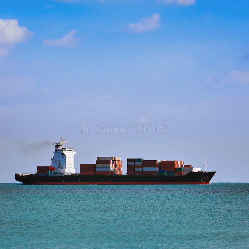 Container Ship in the Sea stock image. Image of house - 82546893