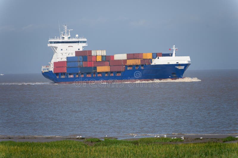 Container ship at sea stock image. Image of mariners - 154025947